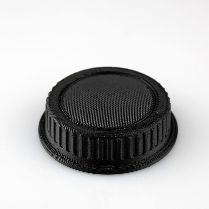 3D Printable Canon Rear Lens Cap by Mieszko Lacinski