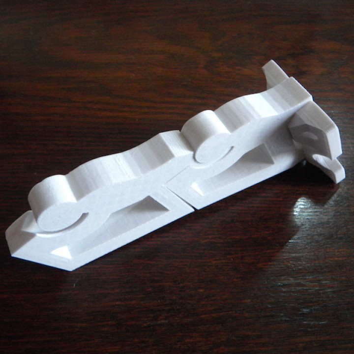 3D Printable Interlocking Bike Wall Mount by Andrew Forster