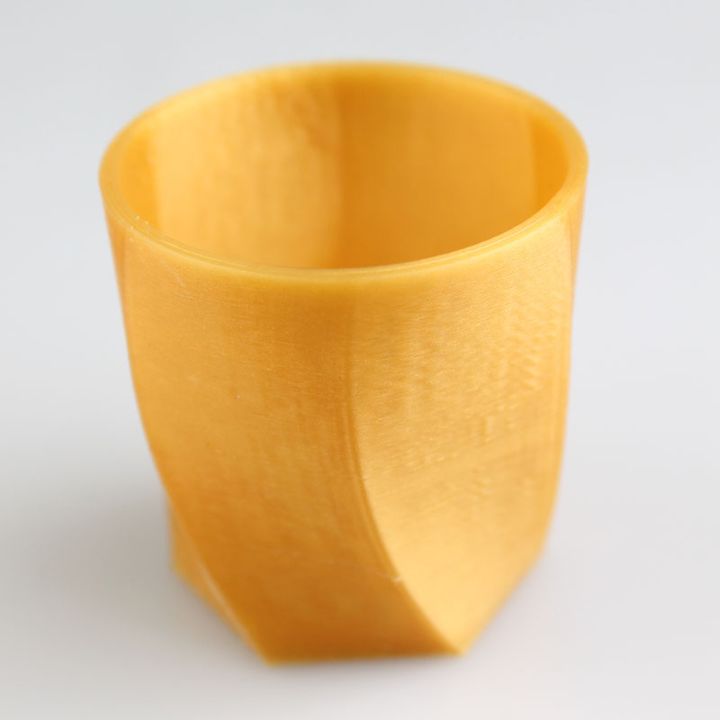 3D Printable Swirly shot glass by Dennis Humphrey