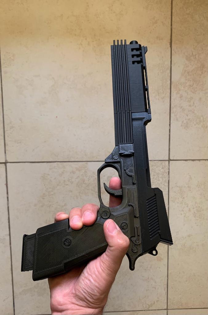 3D Printable Auto9 Pistol from Robocop by Oleg Khmarnyi