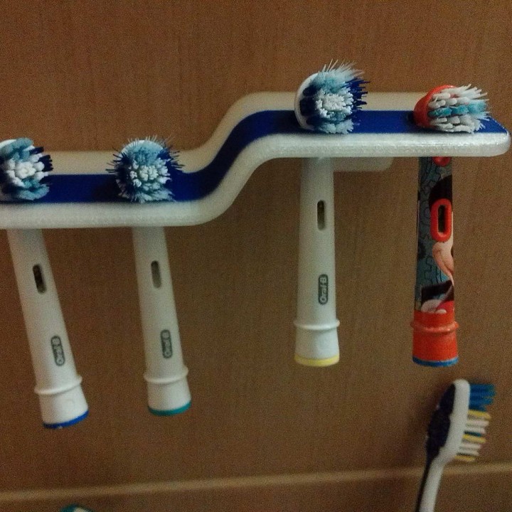 3D Printable Wall mount electric toothbrush holder by Ar Tu