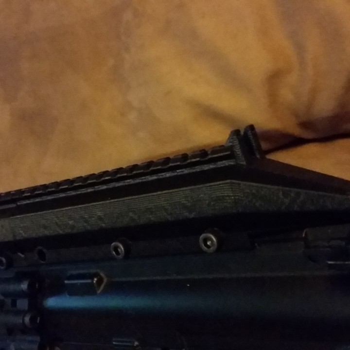 3D Printable Airsoft M4 pistol rail riser and battery holder by John Riggs