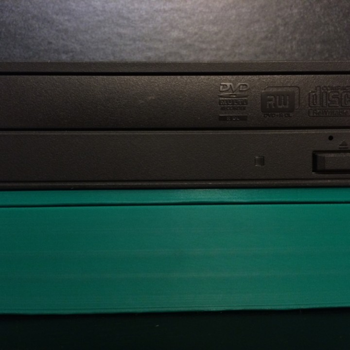 3D Printable 6 x 2.5" Drive to one 5.25 Optical Drive Bay Adapter. by JJ