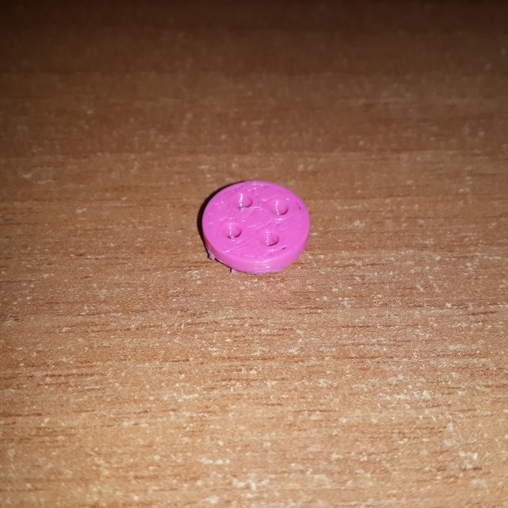 3D Printable Four hole button by Oral Tosun