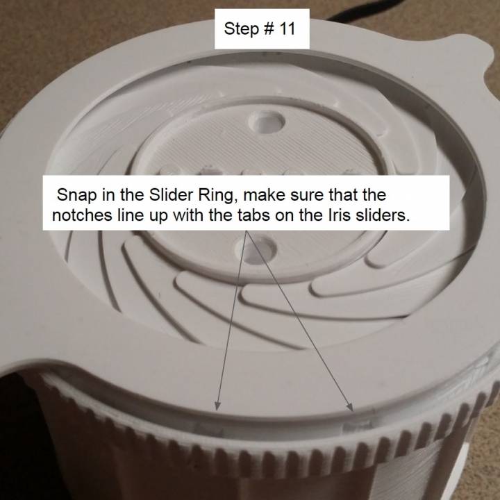 3D Printable Pebble display case with Iris opening. by Matthew Davis