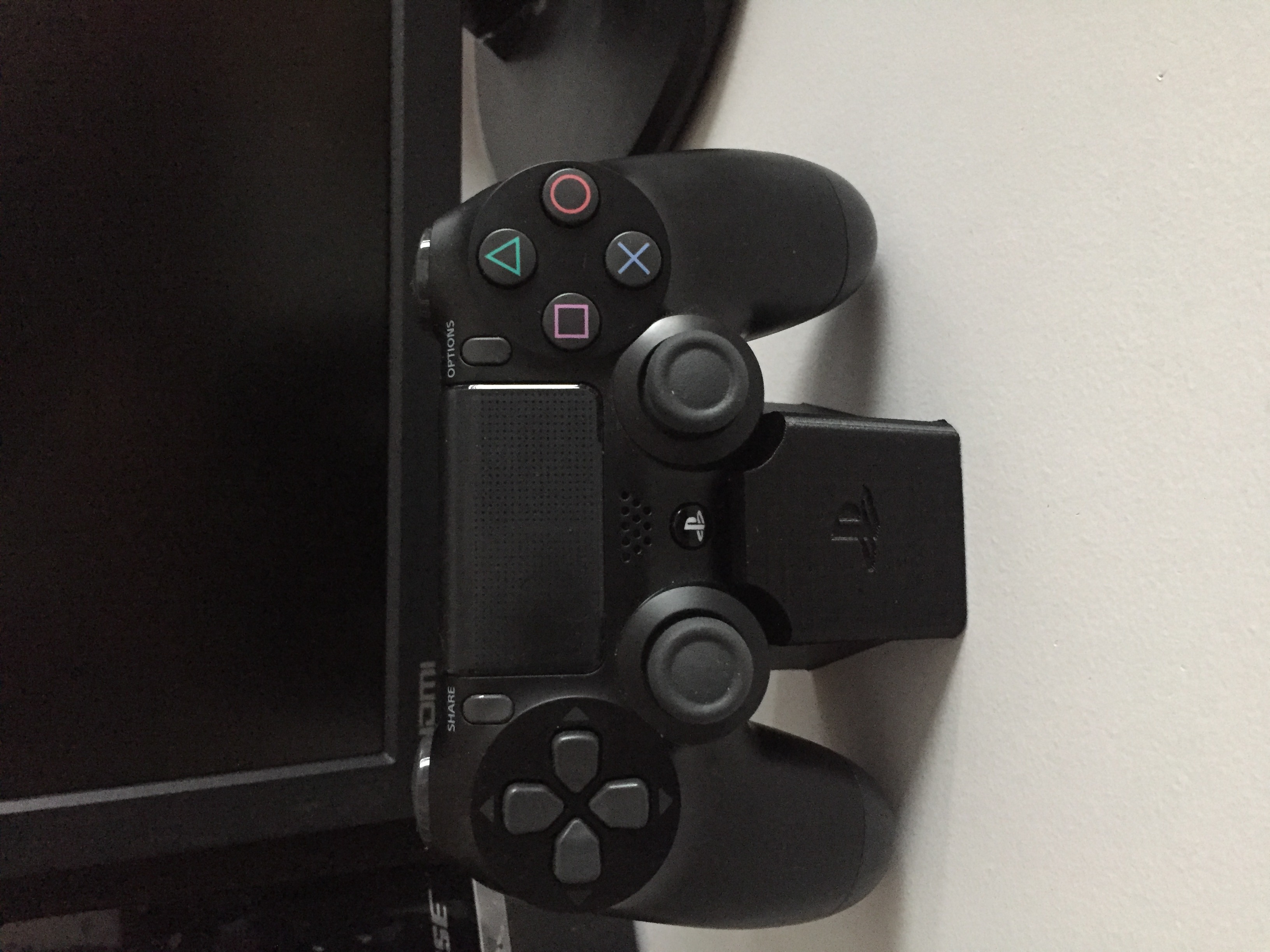 3D Printable PS4 Remote Stand by João Duarte