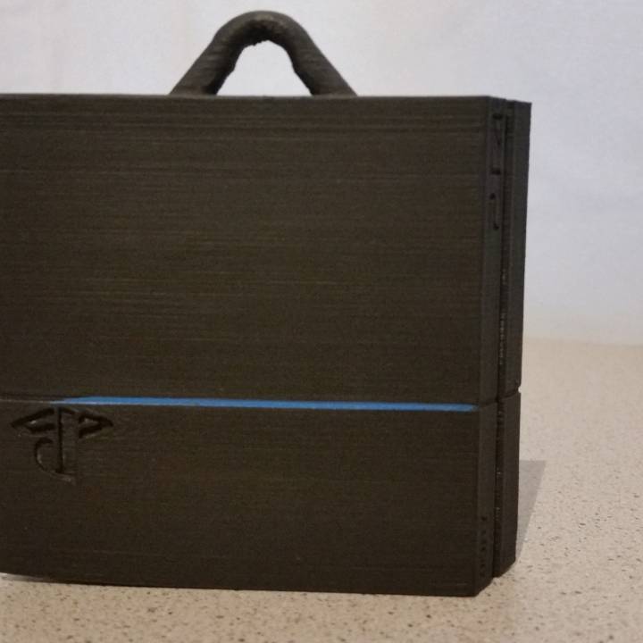 3D Printable Min PS4 Keychain by Garrett Kearney