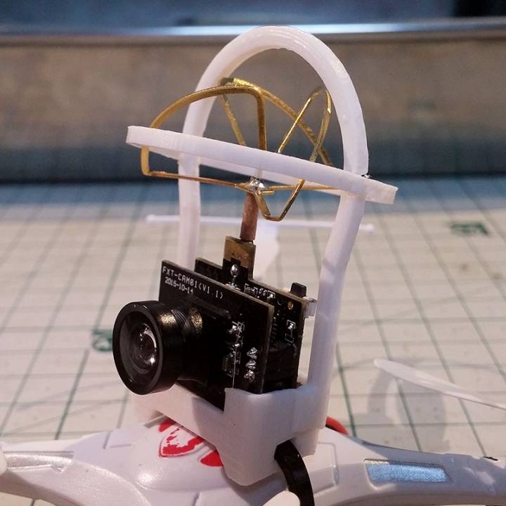 3D Printable The Whoopinator- FPV Quad Camera Mount by Naomi Wu