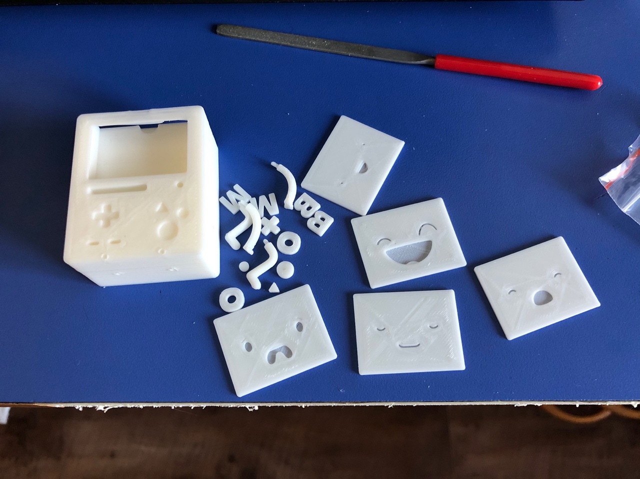 3D Printable Adventure Time BMO -Sitting with faces to change by Oskar ...