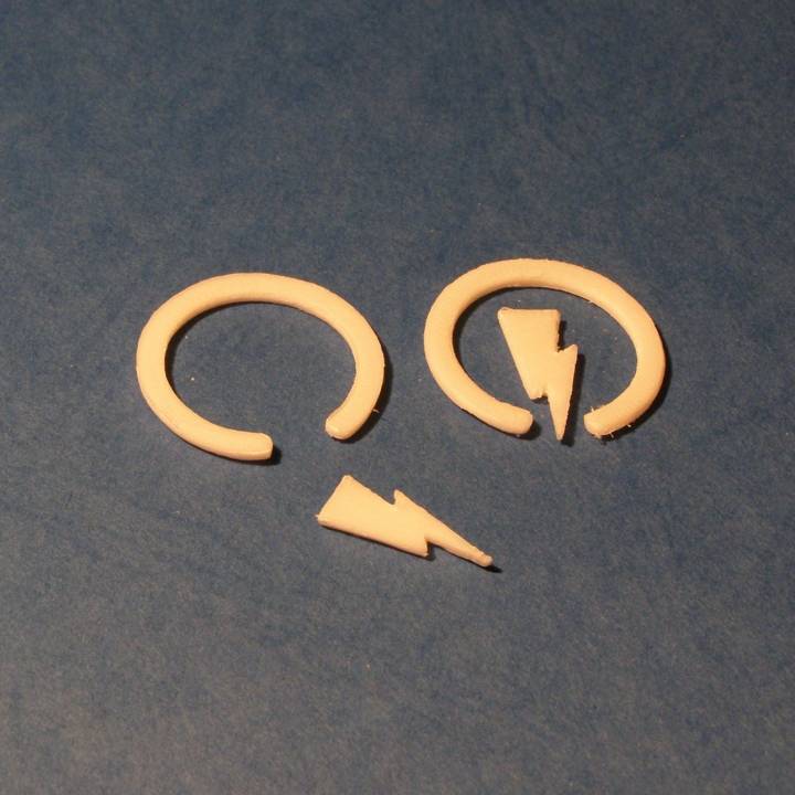 3D Printable Rusty Rivets Badge by Matteo Sgherri