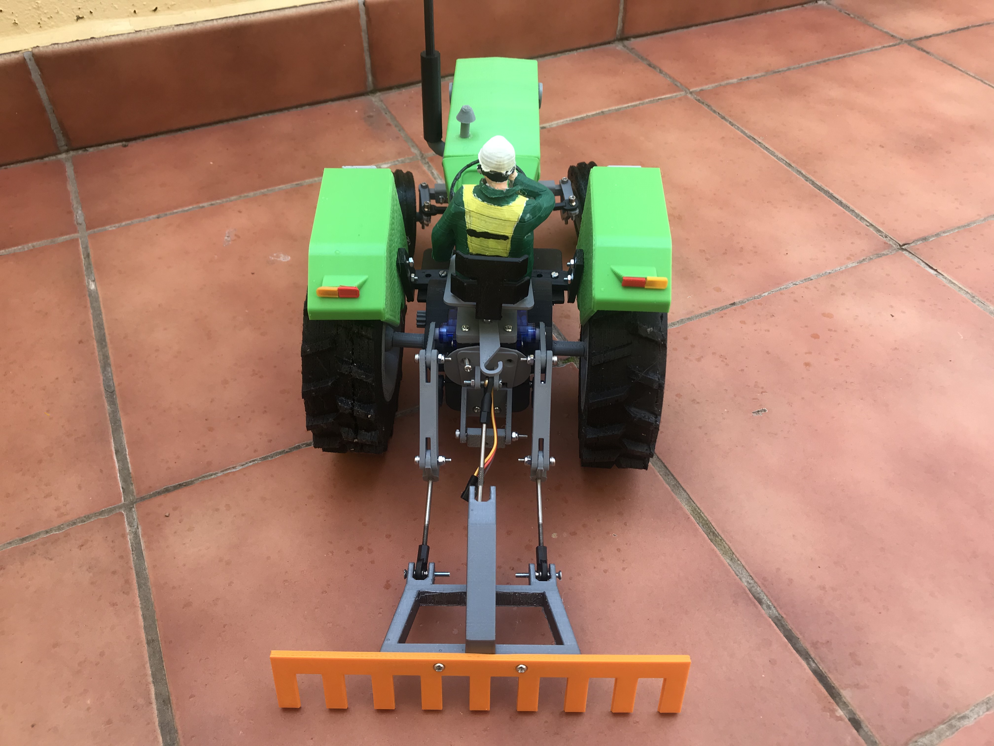 3D Printable OpenRC Tractor rice rake by makit