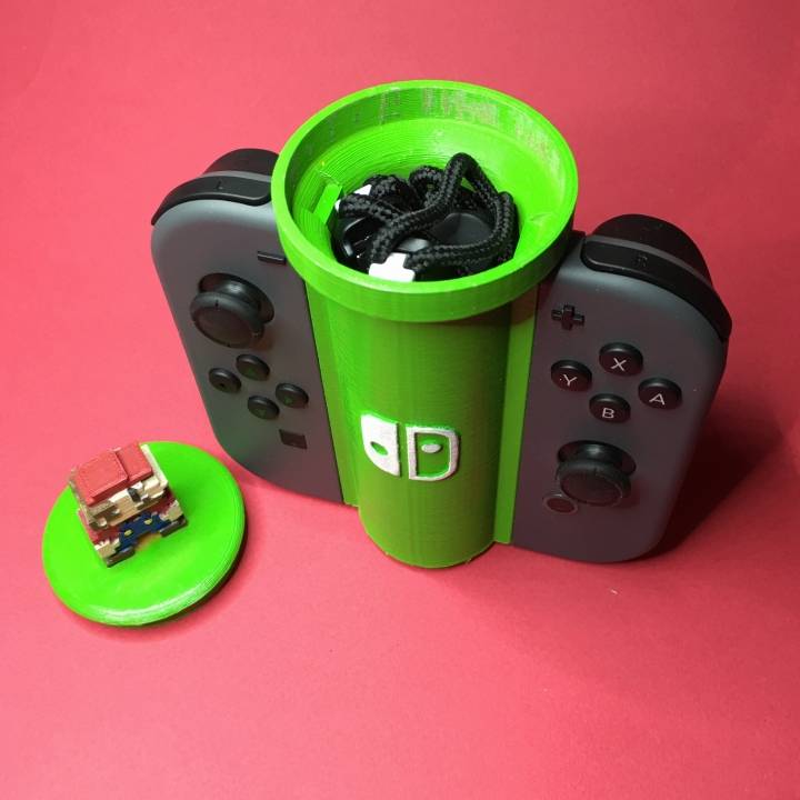3D Printable Nintendo Switch Joy-Con Holder with Storage Room by Fotis ...