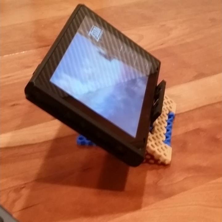 3D Printable Nintendo Switch Stand, Now With Hexagons! by Patrick Gaston