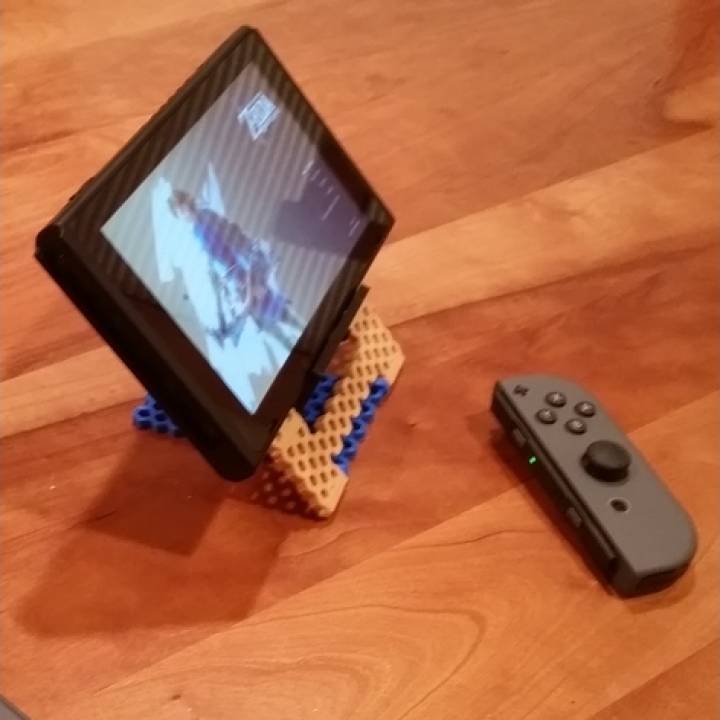 3D Printable Nintendo Switch Stand, Now With Hexagons! by Patrick Gaston