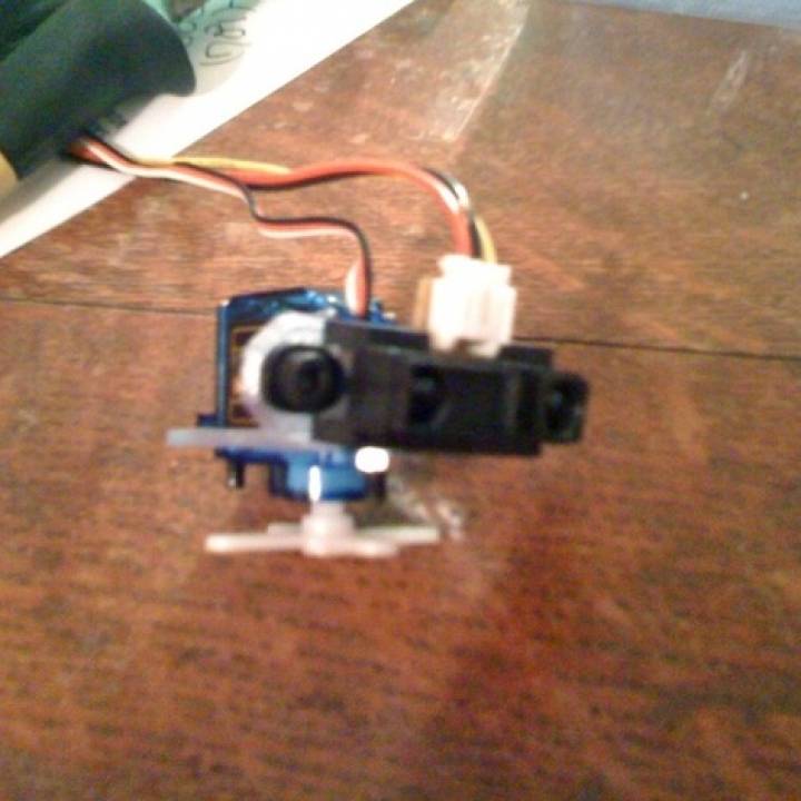 3D Printable Sharp IR Sensor Servo Bracket by Mark Fuller
