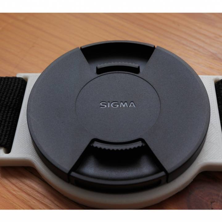 3D Printable Lens cap holder 49mm-58mm-72mm by Frédéric Callondann