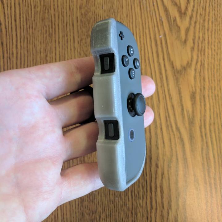 3D Printable Nintendo Switch Joy-Con Cradle Ring by Jon Dunfee