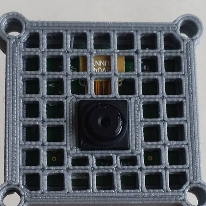 3D Printable Raspberry Pi Camera case with mounting holes by Kjell Kernen