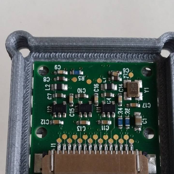 3D Printable Raspberry Pi Camera case with mounting holes by Kjell Kernen