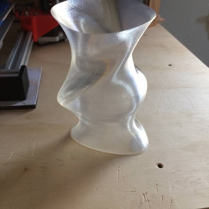 3D Printable Simply Distorted vases 1-10 by thom lamourine