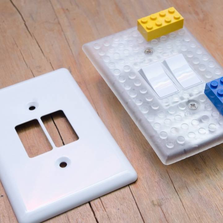 3D Printable Lego Compatible Light Switch Cover by Tom Van den Bon