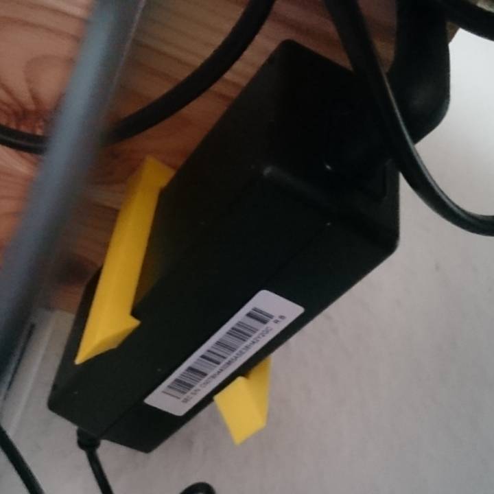 3D Printable Samsung monitor power brick holder by Martina Varsanyi