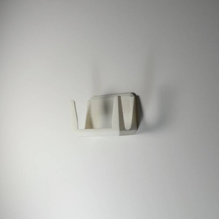 3D Printable Mac Power Adapter Holder by Henry Qiu