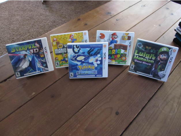 3D Printable Minimalist Nintendo DS and Game Stand by Fluffy