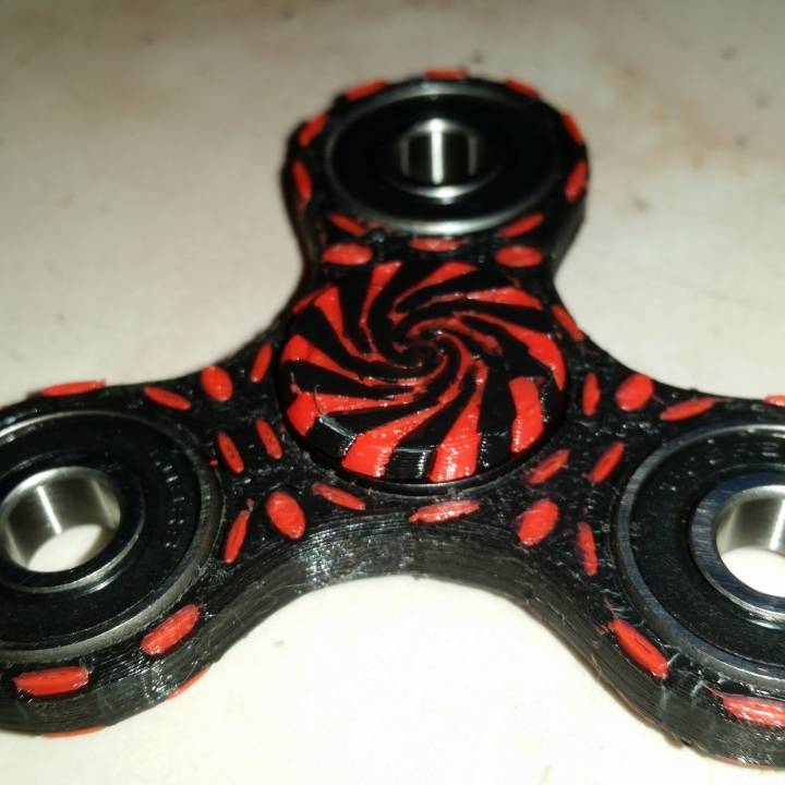 3D Printable Dual Swirl Bearing Cap by Scott Follick