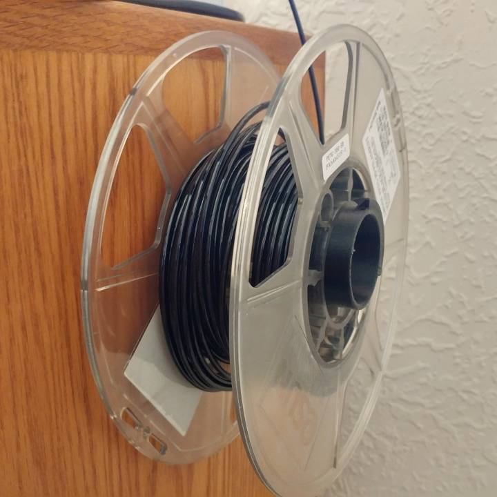 3D Printable Filament Holder Wall Mount by Adrian Ruiz