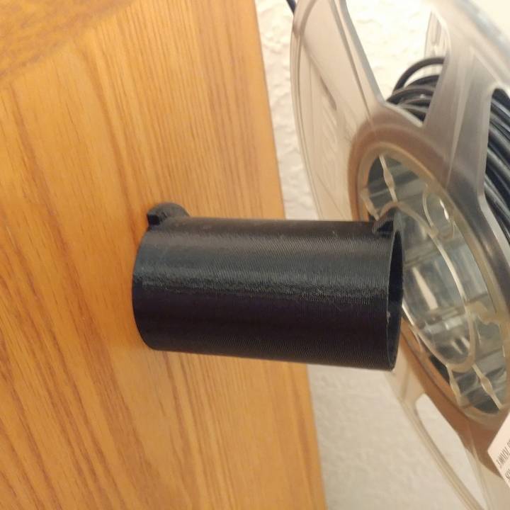 3D Printable Filament Holder Wall Mount by Adrian Ruiz