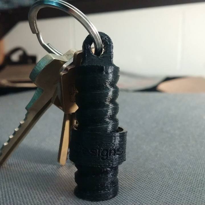 3D Printable Threaded Key Chain Toy by Eugene Pentland