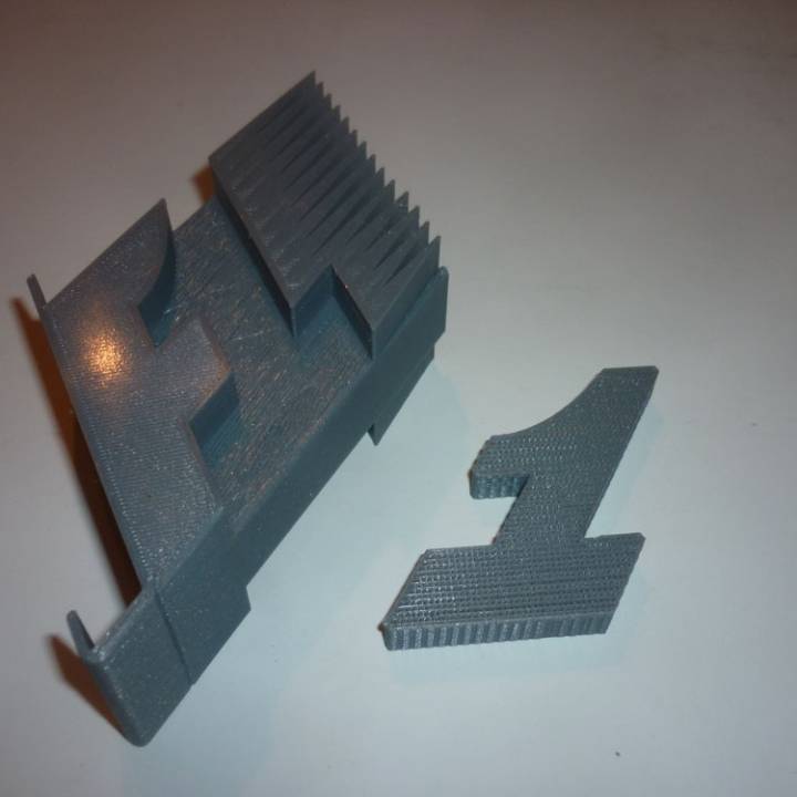 3D Printable F1 Logo Phone Stand by Firas Helou