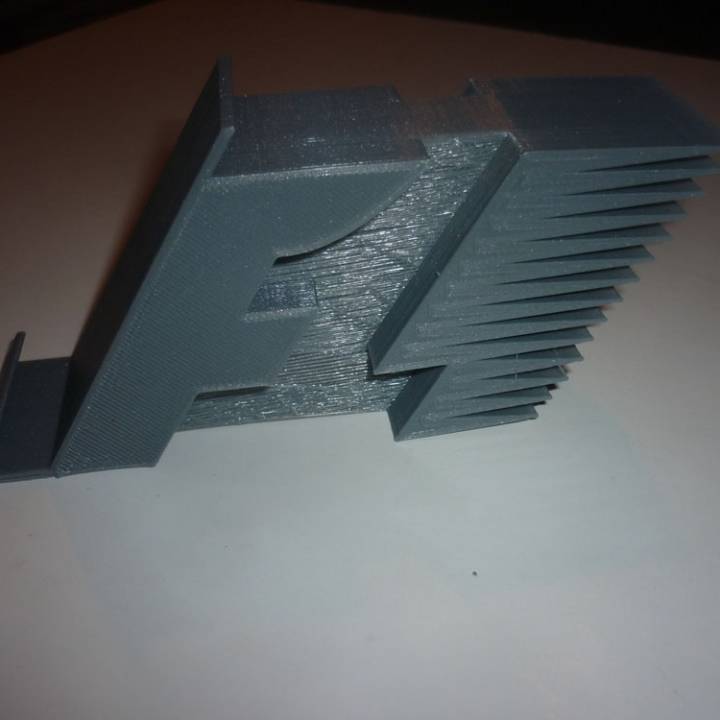 3D Printable F1 Logo Phone Stand by Firas Helou