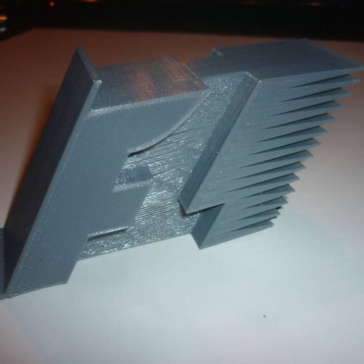 3D Printable F1 Logo Phone Stand by Firas Helou