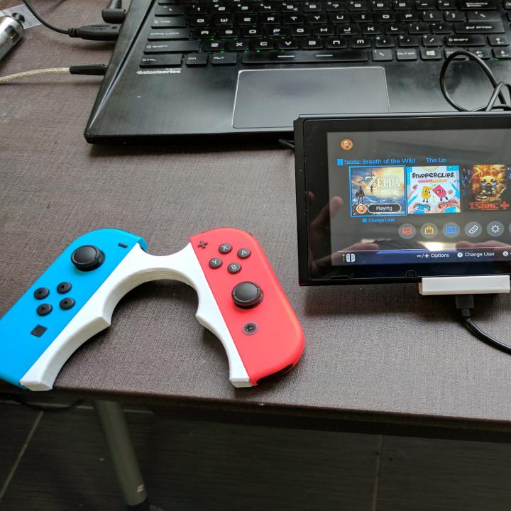 3D Printable Nintendo Switch Print-in-Place Charging Stand by Mike Thompson