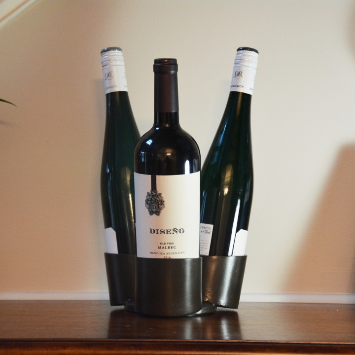3D Printable Spinning Wine Bottle Carousel by Duncan Smith