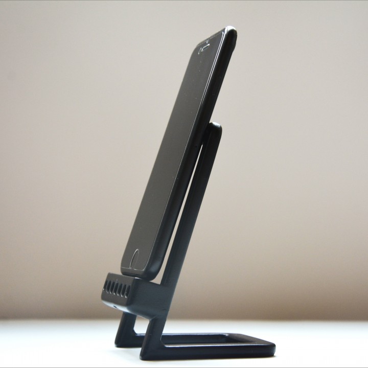 3D Printable Infinity iPhone Stand (Sound Amplifying) by Duncan Smith