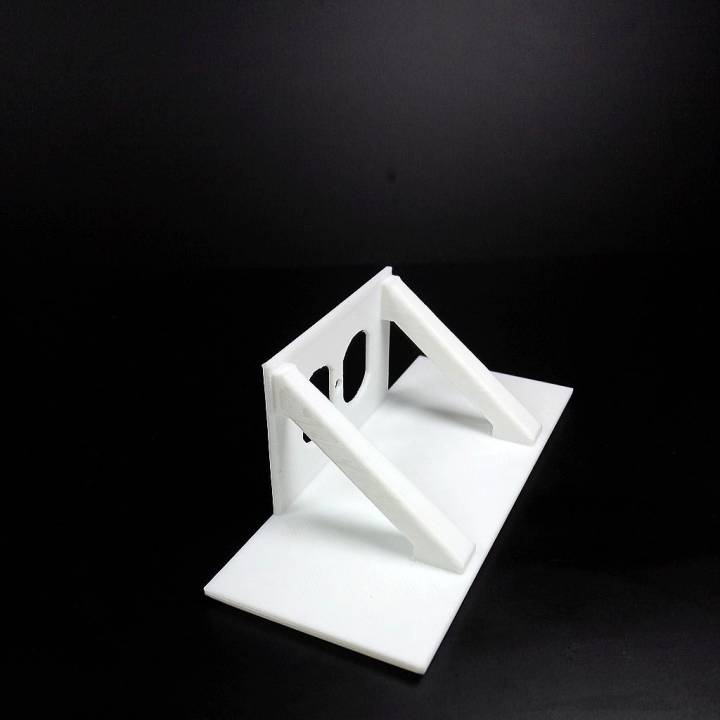 3D Printable Cell Phone Outlet Shelf by Charlie Benedict