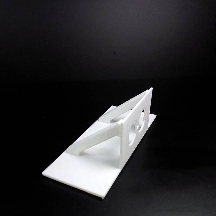 3D Printable Cell Phone Outlet Shelf by Charlie Benedict