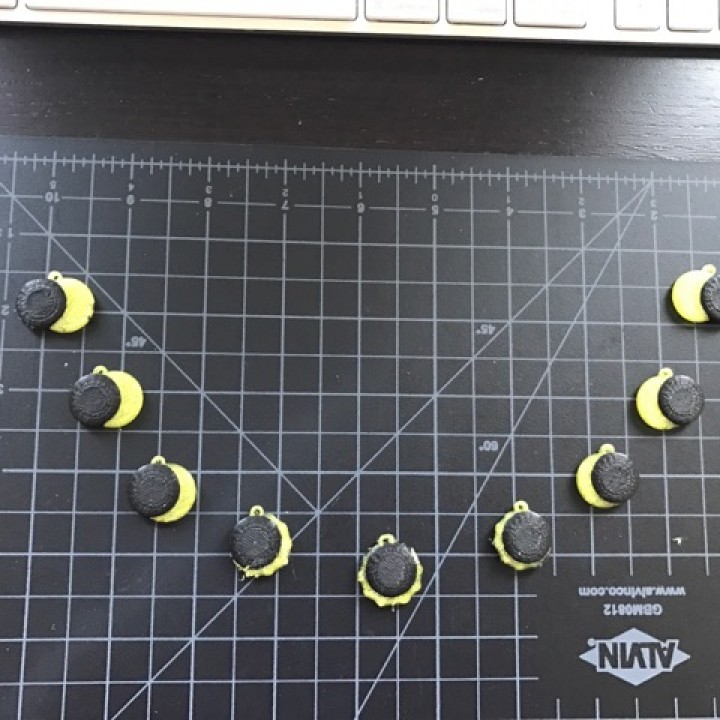 3D Printable Eclipse Pendant Necklace by Maureen Nemetski