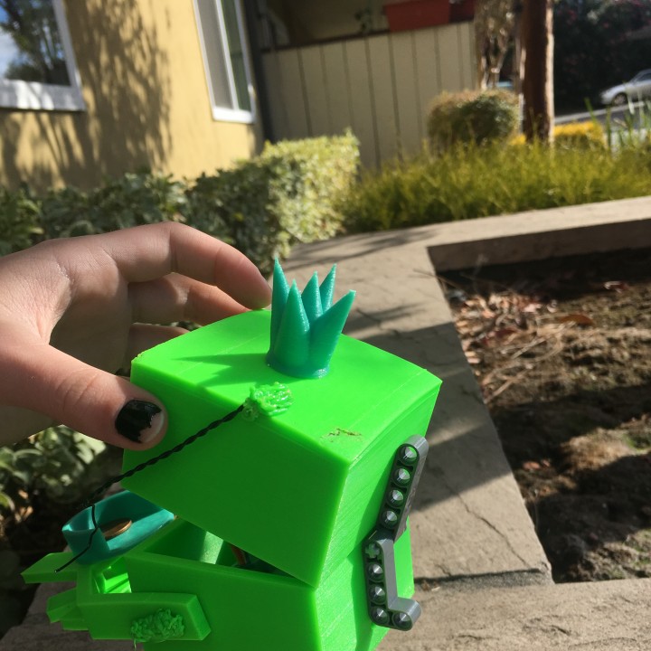 3D Printable candy/coin eating robot by Olga Novichkova