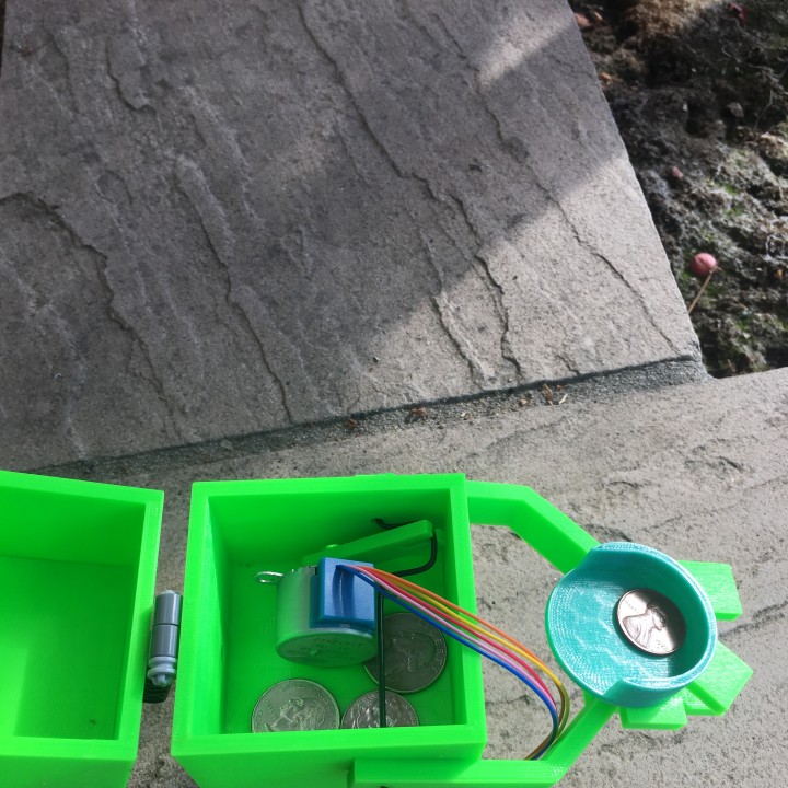 3D Printable candy/coin eating robot by Olga Novichkova