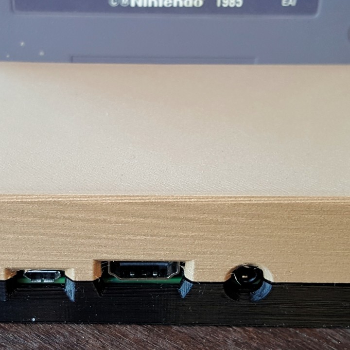 3D Printable NES cartridge holder raspberry pi 3 case. by Darren Furniss