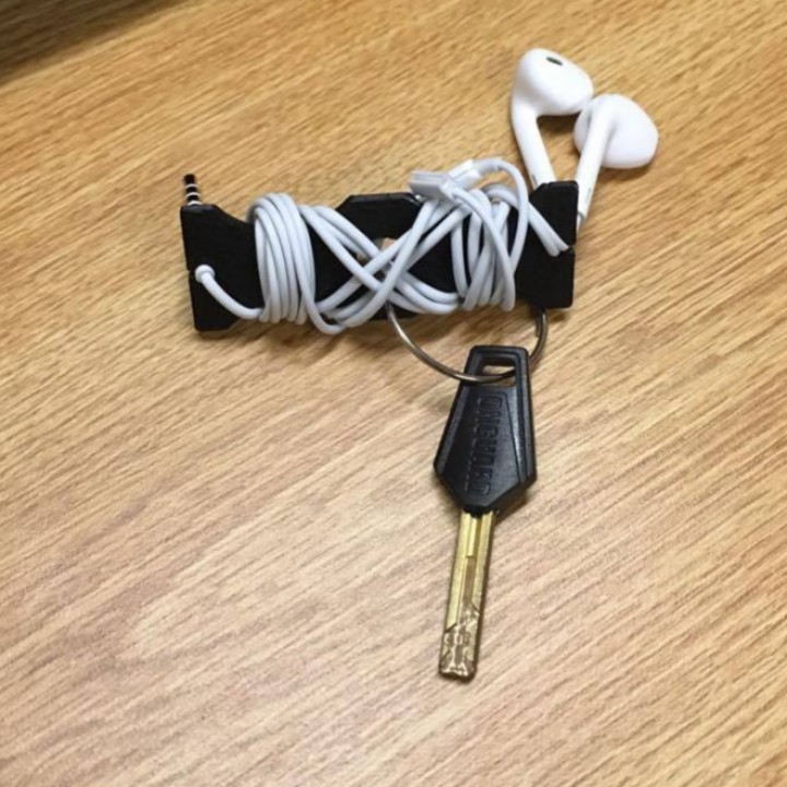 3D Printable Keychain Earbuds Holder by Rhys Switzer