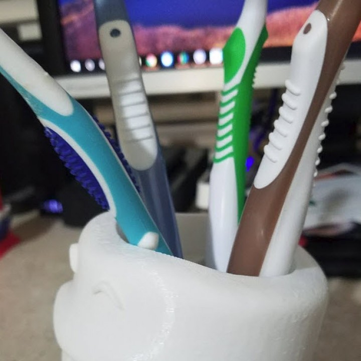 3D Printable Smiling Toothbrush Holder by Brian Barrett