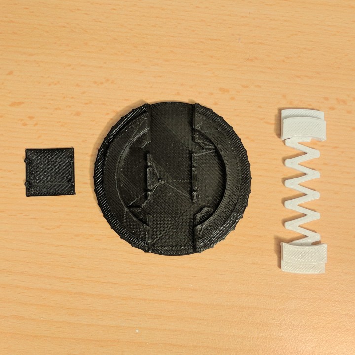 3D Printable 58mm Lens Cap by Chris Horton