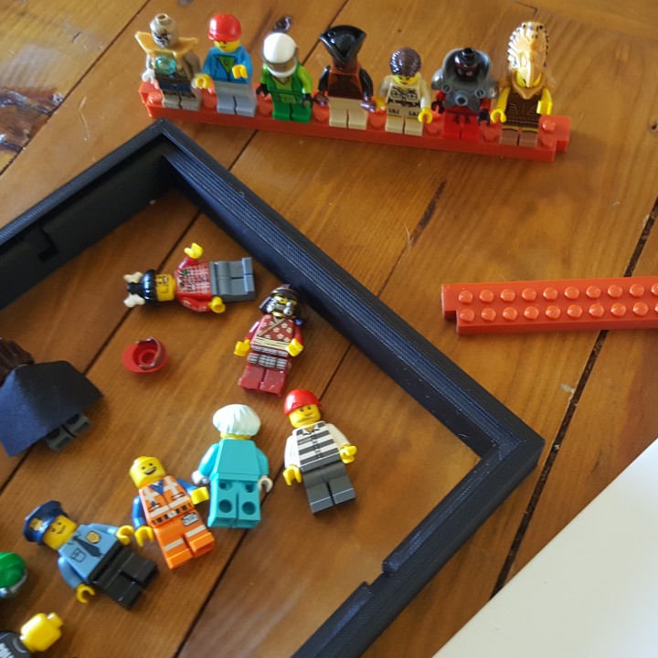 3D Printable Lego figure photo frame shelve. by Darren Furniss