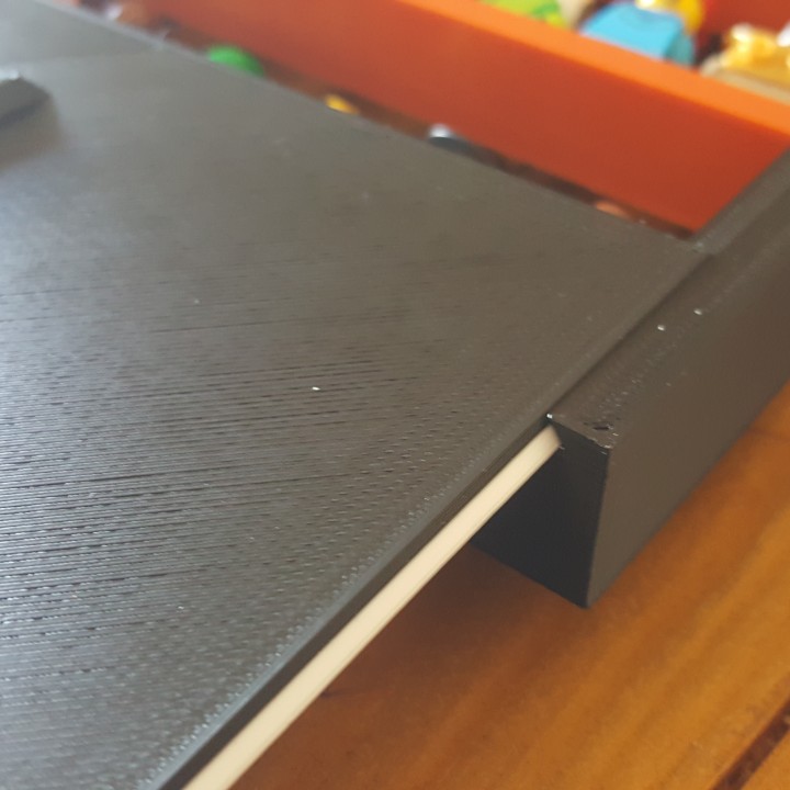 3D Printable Lego figure photo frame shelve. by Darren Furniss