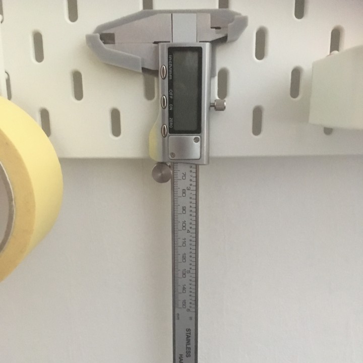 3D Printable Caliper holder for Ikea Skadis Pegboard by David Klem